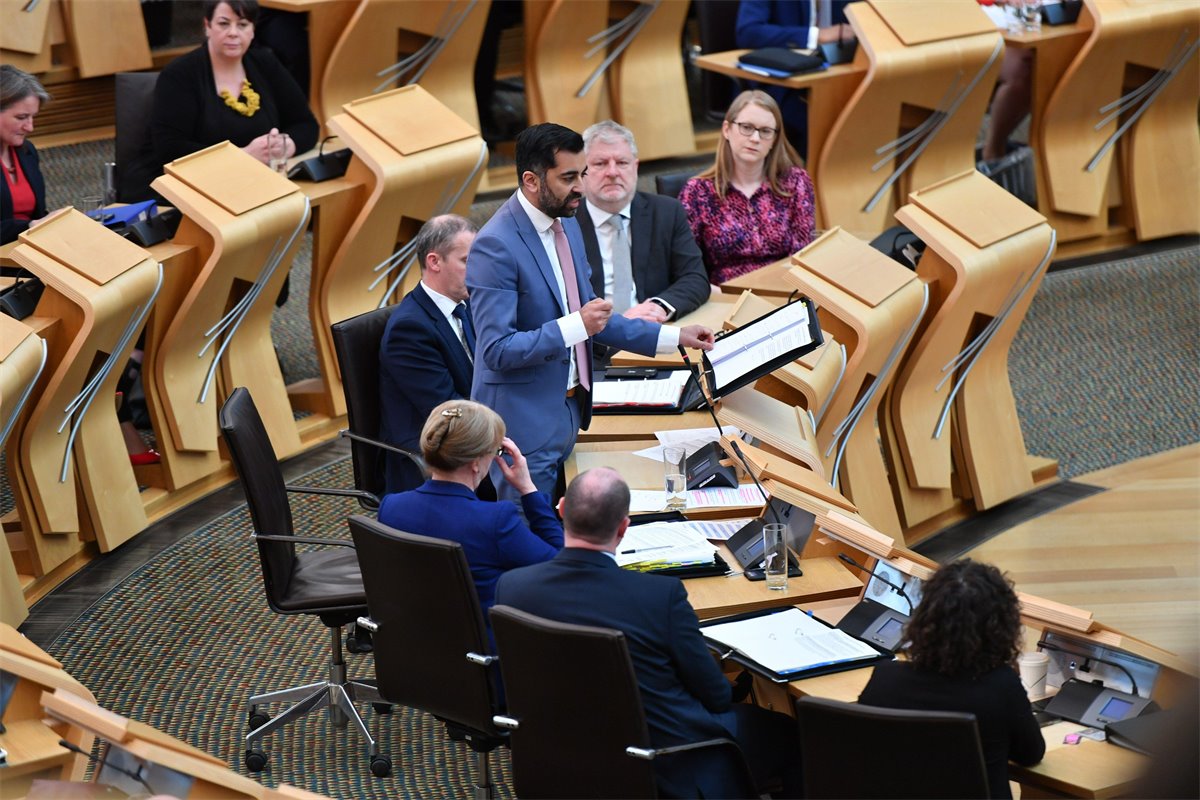 Humza Yousaf defends independence minister post as protests disrupt FMQs